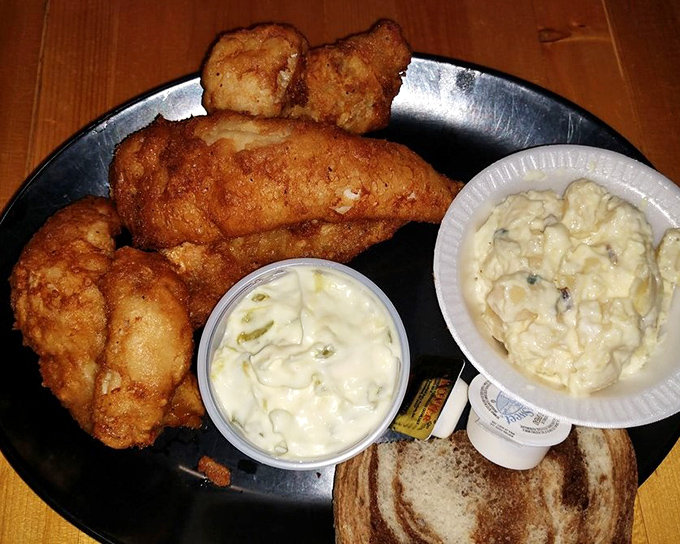 Golden-brown perfection that makes fish skeptics reconsider their life choices. This walleye isn't just dinner; it's a Wisconsin rite of passage.