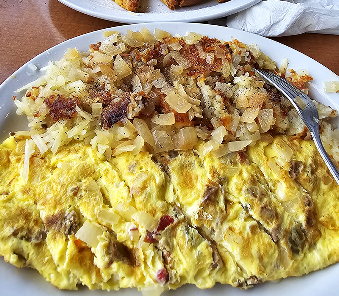 This omelet doesn't just feed you&mdash;it embraces you with fluffy eggs and perfectly crisped home fries that make you question why you ever bother cooking at home.