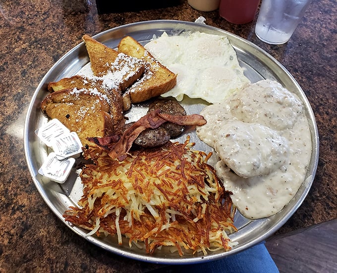 Breakfast nirvana arrives on a metal plate&mdash;crispy hash browns, powdered French toast, and gravy that would make your grandmother both jealous and proud.
