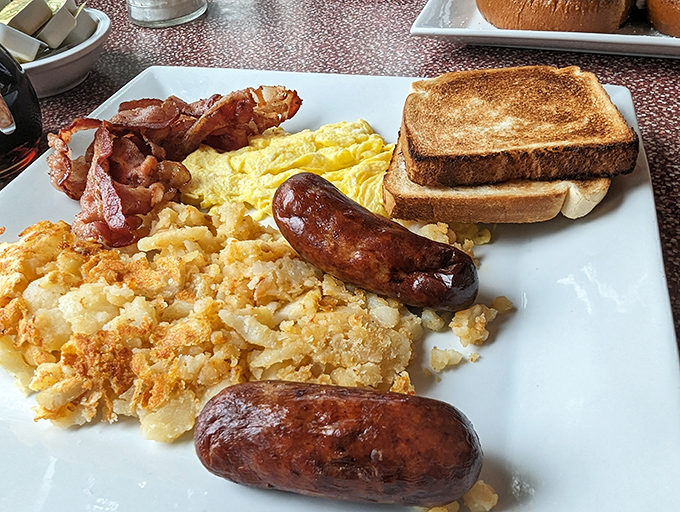 Breakfast perfection doesn't exi&mdash; Oh wait, it does. Those golden hash browns, perfectly cooked sausages, and fluffy eggs create the holy trinity of morning bliss.