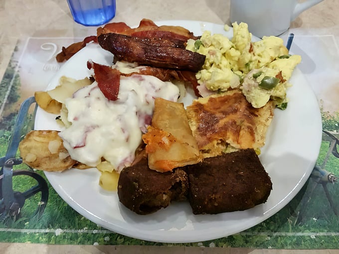 Breakfast buffet bliss on a plate! This isn't just food, it's a carefully curated symphony of creamed chipped beef, scrambled eggs, and pure Pennsylvania morning joy.