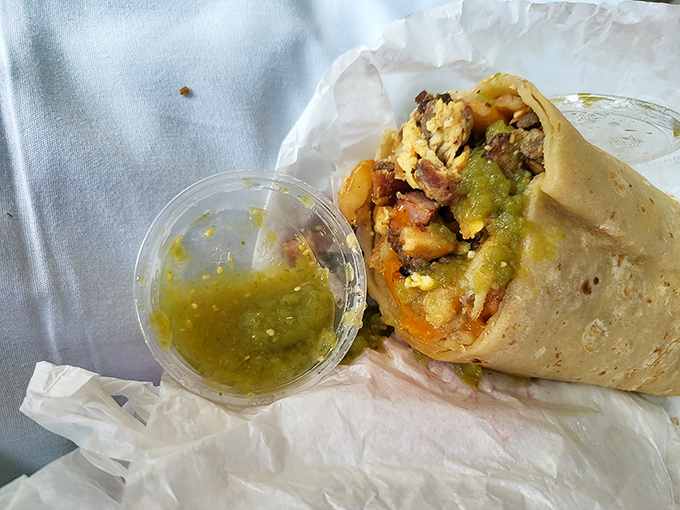 Behold the star of the show&mdash;eggs, potatoes, and meat wrapped in tortilla perfection, with salsa verde standing by for its supporting role.