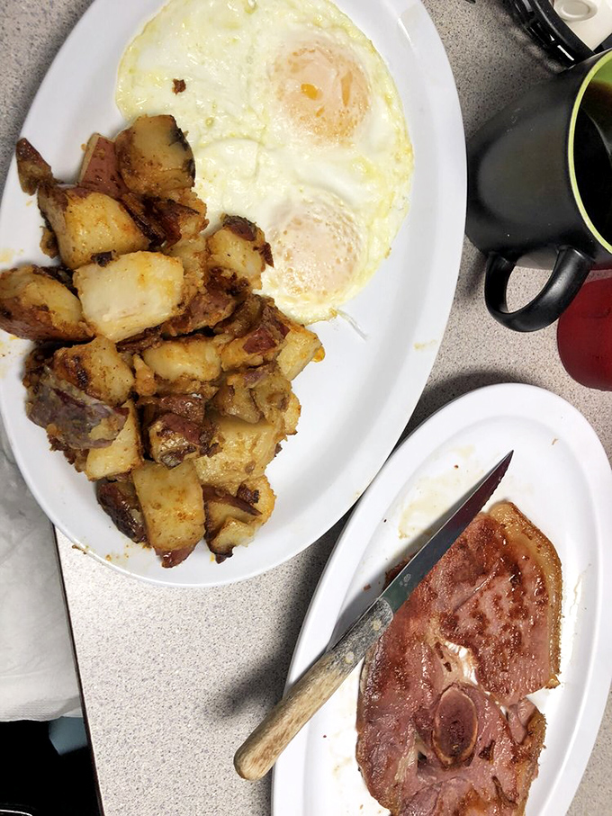Sunny-side up eggs keep watchful eyes over a plateful of home fries that have been crisped to perfection&mdash;breakfast's version of a Renaissance painting.