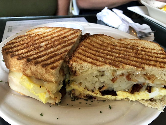 Breakfast panini perfection &ndash; where golden-grilled bread meets fluffy eggs in a morning romance that puts ordinary breakfast sandwiches to shame.