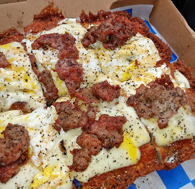 Scrapple and eggs unite in holy matrimony atop this Delaware breakfast masterpiece. It's the morning equivalent of finding money in your coat pocket.