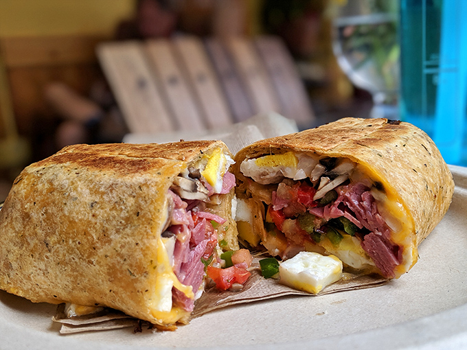 This breakfast burrito isn't just food—it's edible architecture. Layers of flavor wrapped in a tortilla that's been kissed by the grill.