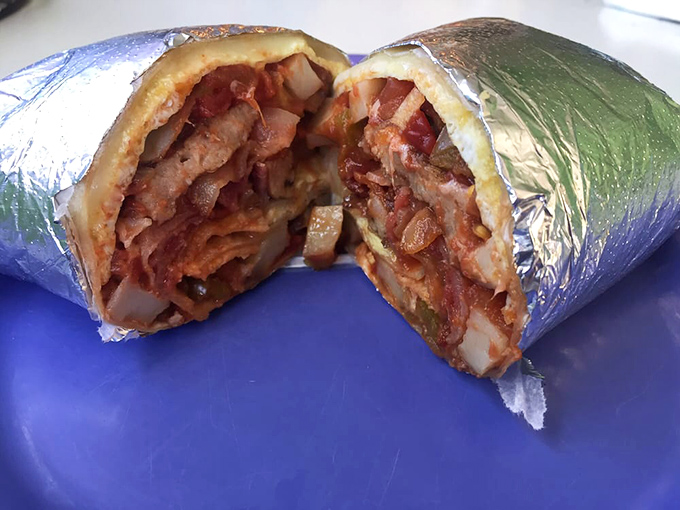 This breakfast burrito isn't messing around. Packed tighter than a weekend ferry to Key West, it's a handheld vacation wrapped in foil.