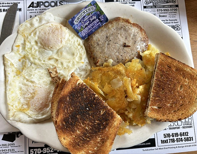 Sunny-side up eggs with a side of sausage&mdash;the breakfast equivalent of a warm hug from your favorite aunt who still pinches your cheeks.