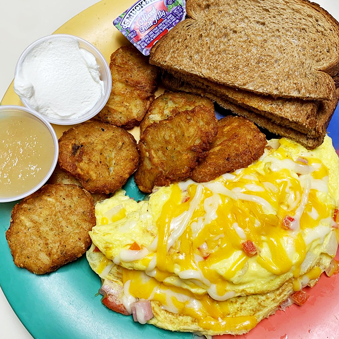 Cheese-draped eggs, golden hash browns, and whole wheat toast—the breakfast trinity that's launched a thousand productive days and cured countless celebratory nights before.