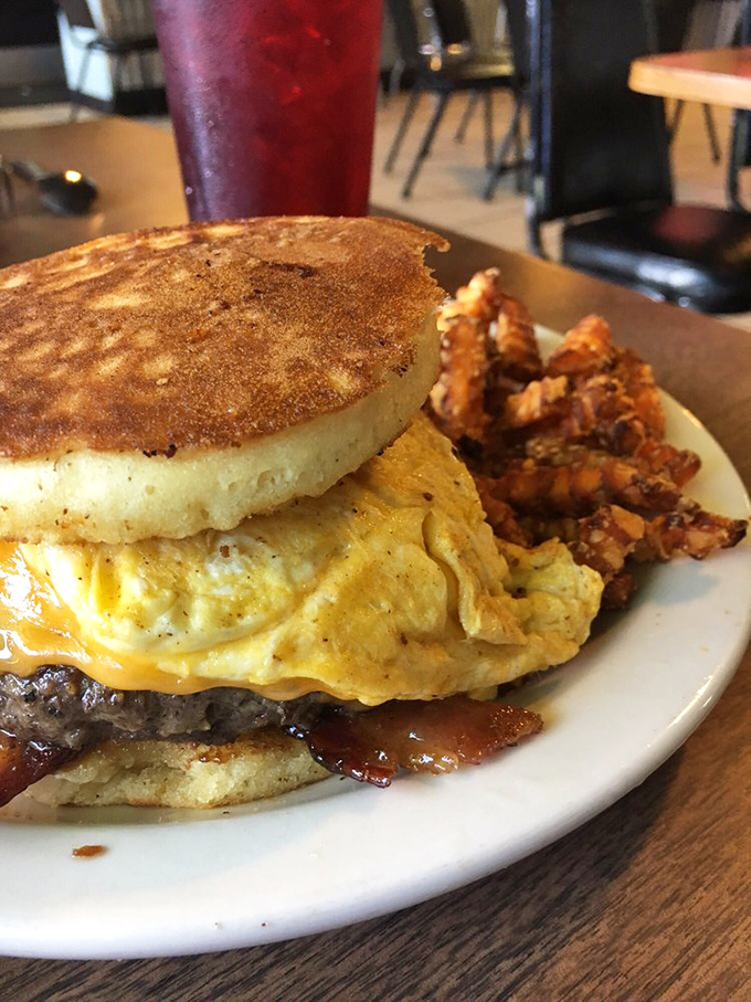 Behold the breakfast sandwich that proves sometimes the simplest pleasures deliver the most satisfying results in life.