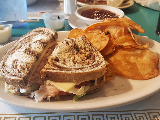 A proper sandwich isn't just lunch&mdash;it's architecture. This masterpiece with homemade chips proves someone in that kitchen understands the importance of structural integrity.