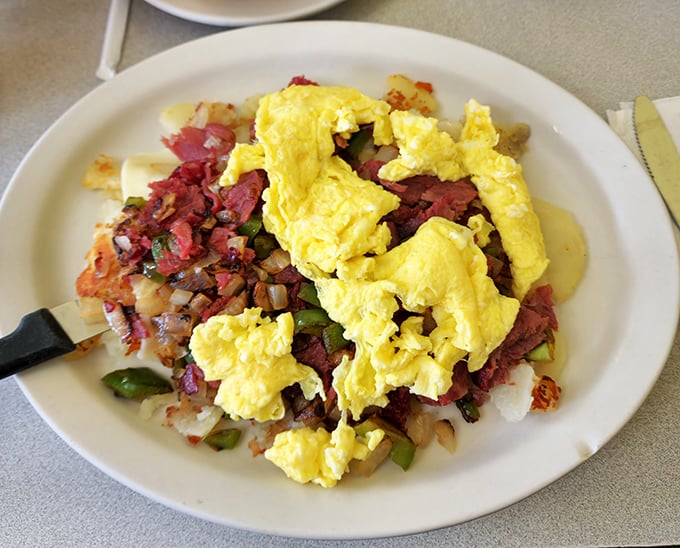 This breakfast skillet doesn't just break the fast &ndash; it demolishes it with a harmony of corned beef, crispy potatoes, and eggs that would make Mozart jealous.