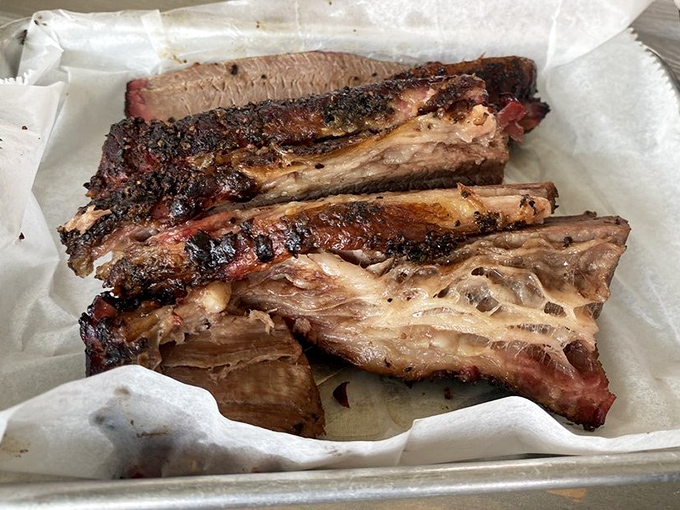 Behold: brisket that's spent more time perfecting itself than most of us spend at the gym. That bark! That smoke ring! That's not food &ndash; that's art.