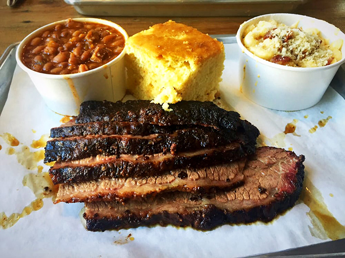 Behold the brisket that launched a thousand road trips&mdash;that perfect smoke ring is nature's way of saying "you're welcome."
