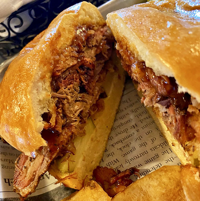 Behold the legendary SQH Brisket Sandwich in all its glory! Tender, smoky meat embraced by a brioche bun with just enough BBQ sauce to enhance, not overwhelm. Worth every mile of the journey.