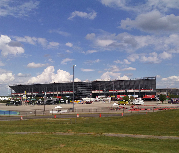 The massive Michigan International Speedway dominates the landscape, transforming quiet countryside into racing paradise seasonally.