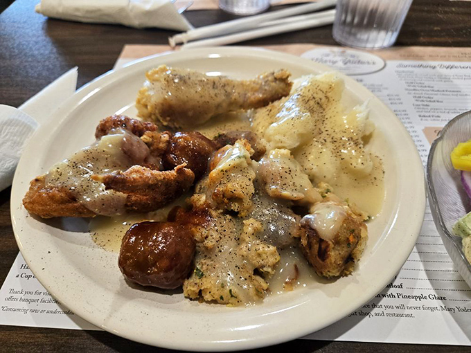 Behold: the plate that launched a thousand food comas. Crispy fried chicken and creamy gravy&mdash;a combination that makes diets wave white flags.