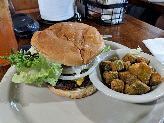 Not all heroes wear capes; some come on a bun with crispy fried okra on the side. This burger means business.