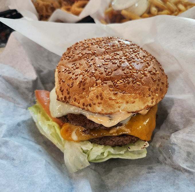 Behold the sesame-crowned beauty that's converting Central Valley skeptics into devoted burger believers, one bite at a time.