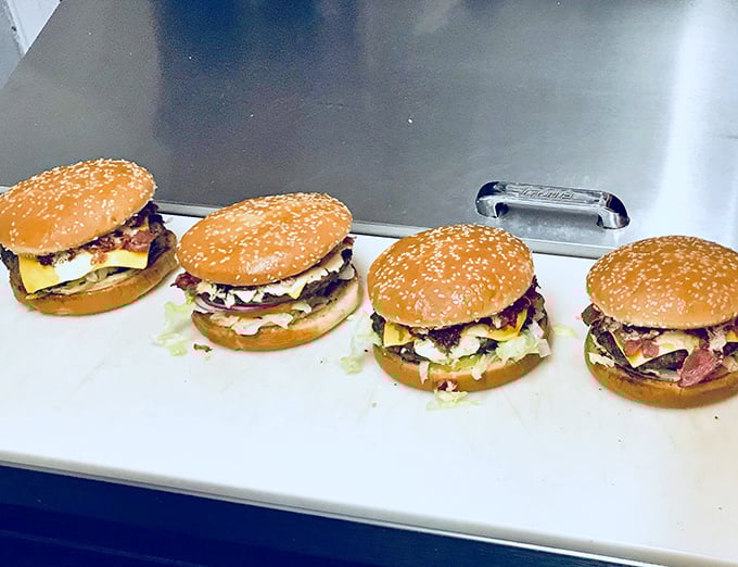 Burger perfection, lined up and ready for action. These hand-crafted beauties showcase the simple magic of quality ingredients done right.