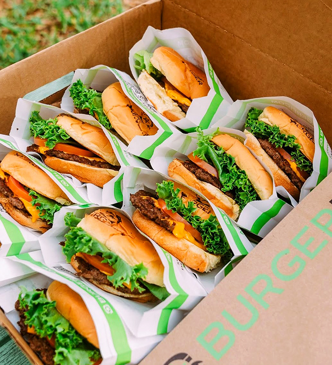 A box of BurgerFi burgers is like a treasure chest for grown-ups. Fresh lettuce and perfectly toasted buns make these beauties ready for their close-up. 