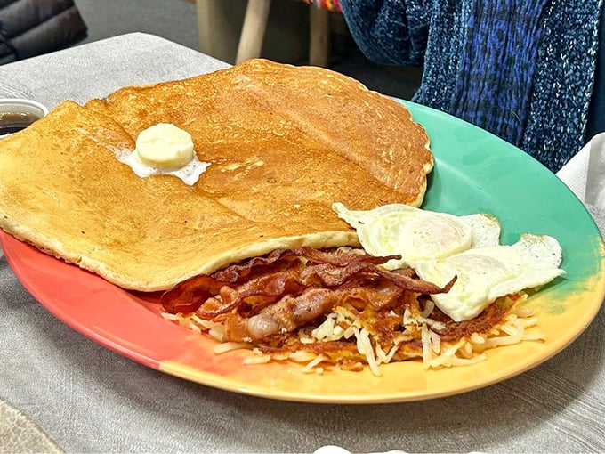 Behold the legendary buttermilk pancake - a breakfast monument that makes regular pancakes look like appetizers.