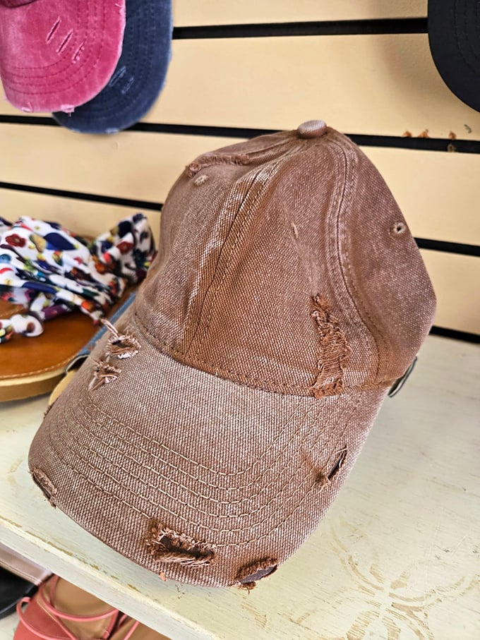 Even distressed can impress! This weathered cap tells stories of adventures past while waiting for its next chapter with a new owner.
