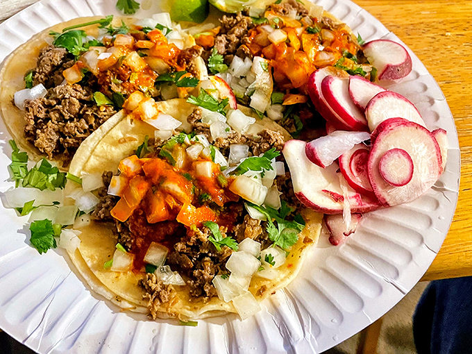 These carne asada tacos aren't just food; they're an edible love letter to Mexico, complete with the traditional garnish of radish slices and fresh lime.