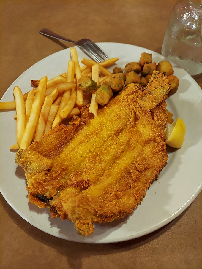 Golden-crusted and perfectly fried, this mountain trout wears its cornmeal coating like a designer outfit &ndash; simple, elegant, and making everything else on the plate look better.