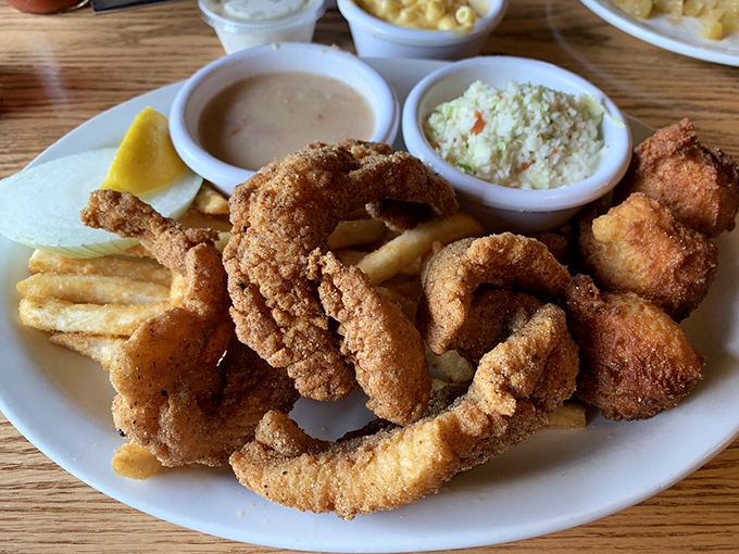 Golden-brown catfish that breaks apart at the mere suggestion of your fork, served with sides that don't know the meaning of "afterthought."