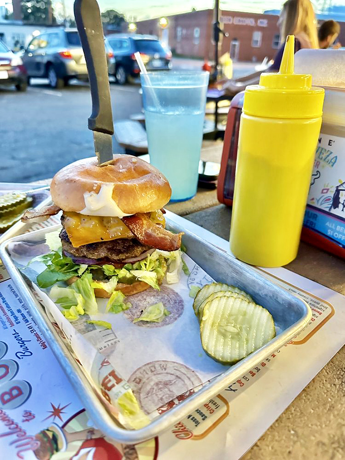 This isn't just a burger—it's architecture. Notice how that perfect cheese drape requires both structural integrity and melt-factor precision.
