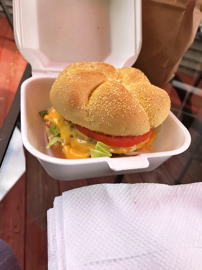 This isn't just a cheeseburger &ndash; it's edible poetry with melty American cheese playing the starring role.