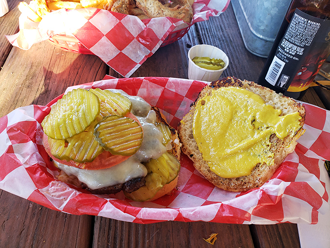 Behold the burger that launched a thousand road trips. Those griddle-kissed pickles and melted cheese demand a moment of reverent silence.