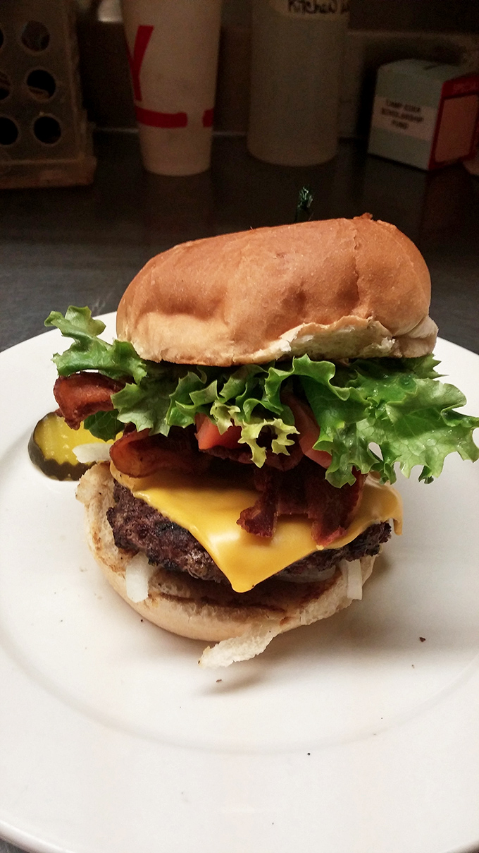 This towering cheeseburger proves that sometimes bigger really is better for your taste buds.