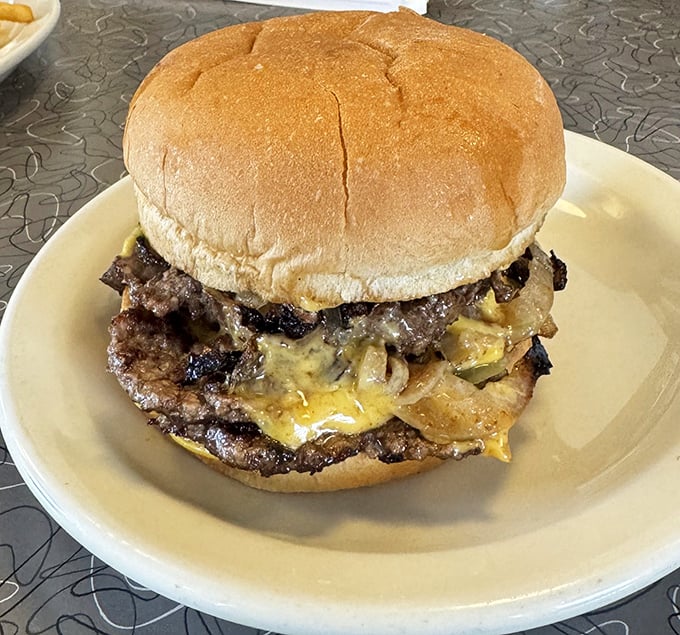 This double cheeseburger isn't trying to reinvent the wheel&mdash;it's simply perfecting it. Melted cheese cascades over caramelized patties like a savory waterfall.