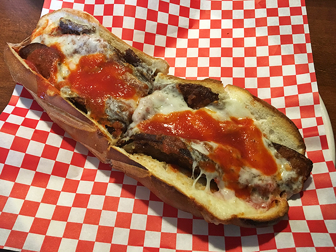 This isn't just a cheesesteak&mdash;it's a masterclass in sandwich architecture. The sauce-to-meat-to-cheese ratio would make Frank Lloyd Wright weep with joy. 