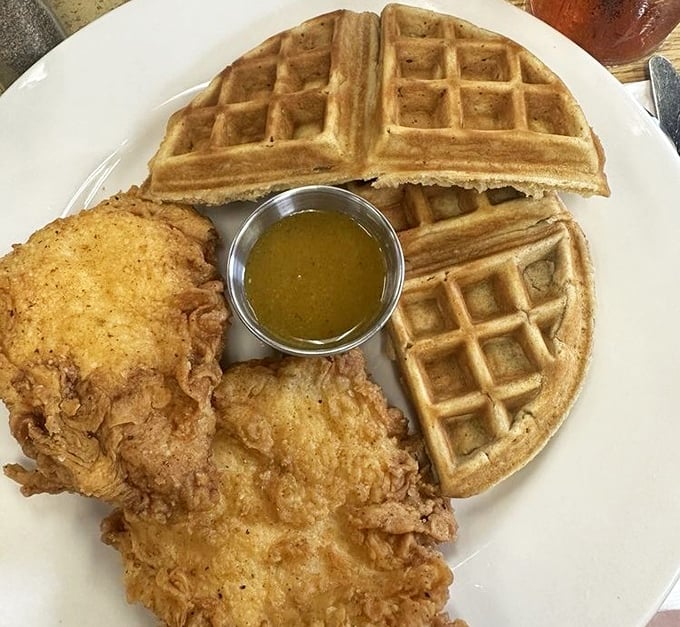 Golden perfection meets Southern comfort in this heavenly marriage of crispy chicken and fluffy waffles.