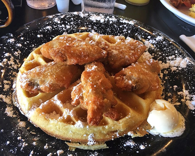 
Chicken and waffles: where Southern comfort meets Midwestern hospitality. That powdered sugar dusting isn't decoration&mdash;it's a blessing from the breakfast gods.