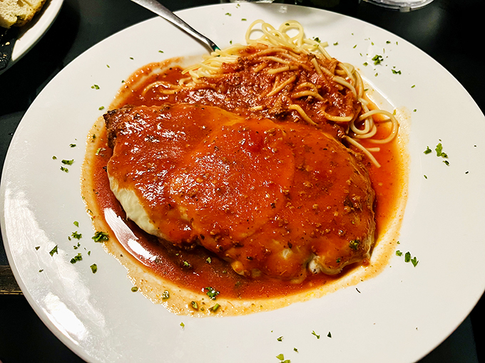 Behold the star attraction: chicken parmesan that could make an Italian grandmother weep with joy. That sauce-to-cheese ratio is mathematical perfection.