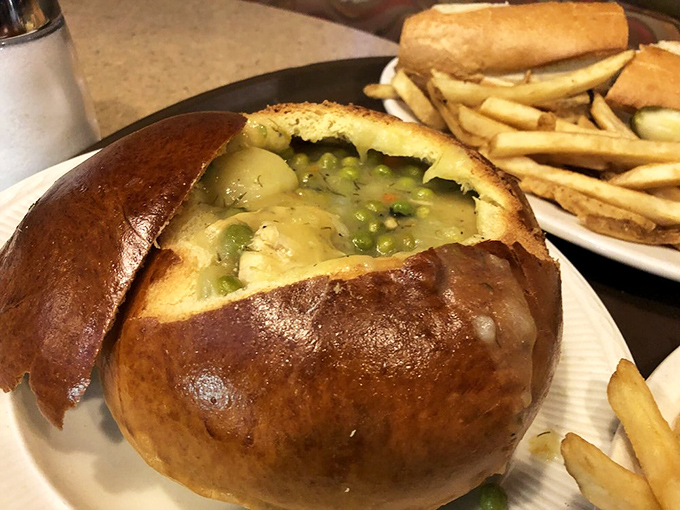 The star of the show&mdash;a chicken pot pie that doesn't just arrive at your table, it makes an entrance. That golden-brown dome harbors treasures worth the trip.