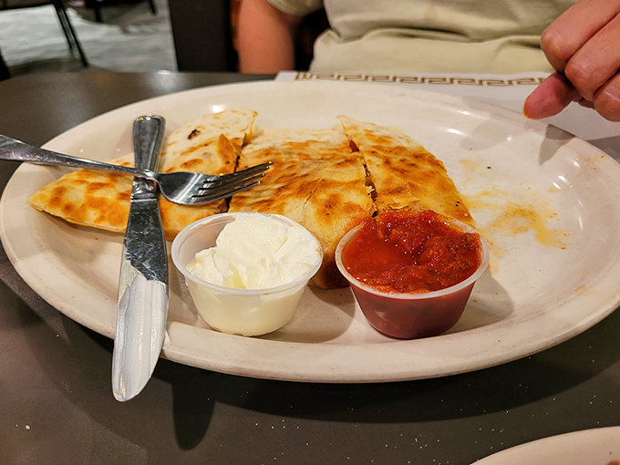 Golden-brown quesadillas with the perfect cheese pull, served with sour cream and salsa. Simple pleasures executed with surprising finesse.