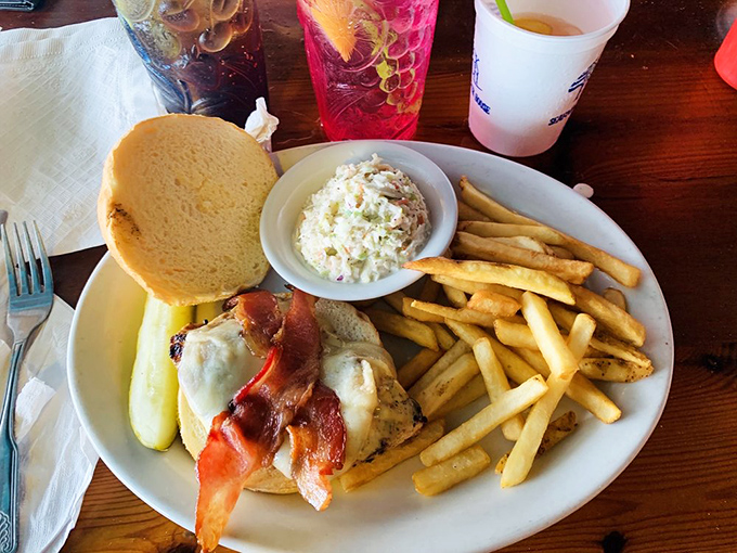 This isn't just a sandwich; it's a masterpiece of bacon, melted cheese, and chicken that makes you question your seafood loyalties right on the Gulf Coast.