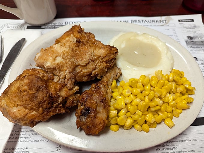 Golden-brown perfection on a plate. This fried chicken doesn't need Instagram filters – it's been collecting real-life likes since before social media existed.