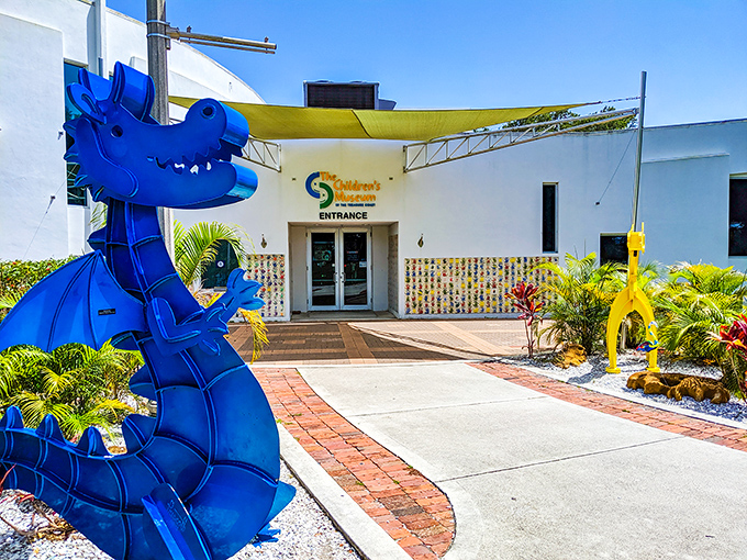 The Children's Museum's blue dragon guardian seems to say, "Inside these walls, imagination outranks screen time every single day."