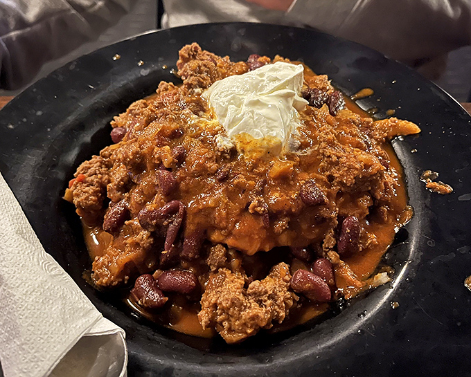 Behold the legendary chili in all its glory&mdash;a bubbling cauldron of beefy goodness topped with a cool island of sour cream.