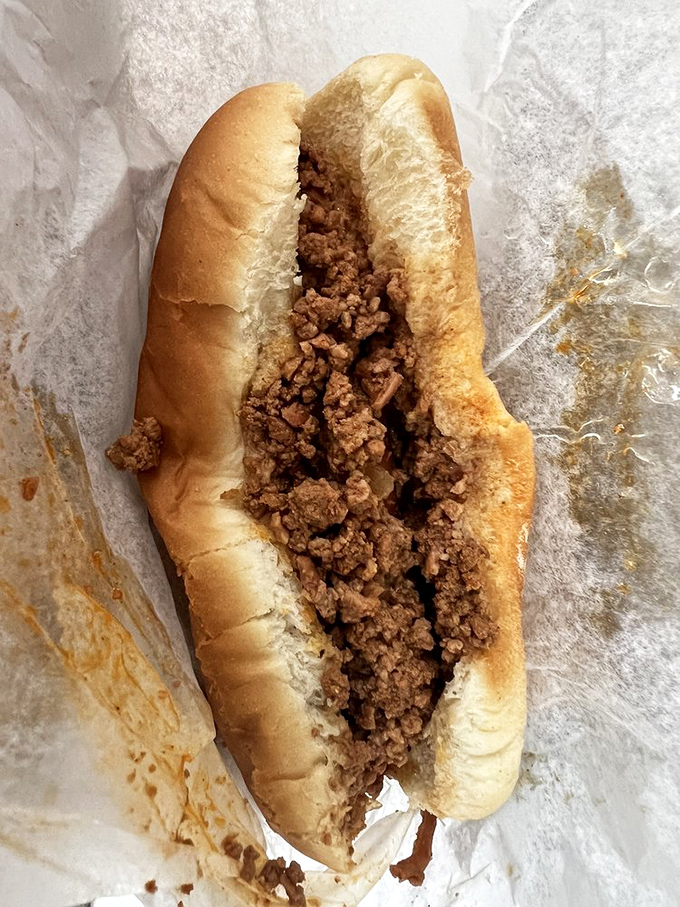 Behold the masterpiece: perfectly grilled franks crowned with rich, meaty chili that'll make your taste buds sing.