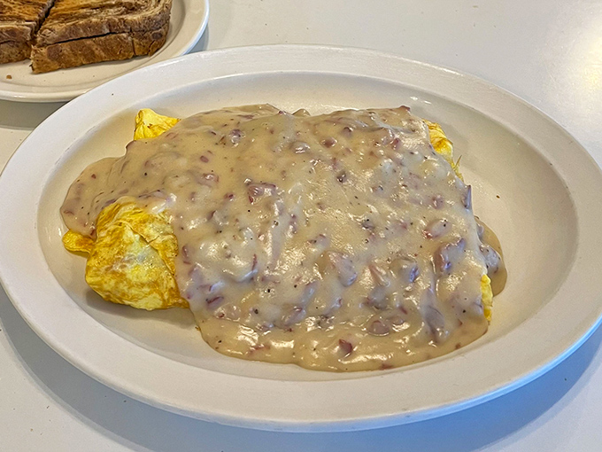 Chipped beef gravy that would make your grandmother weep with joy, smothering eggs in a blanket of creamy, savory perfection.