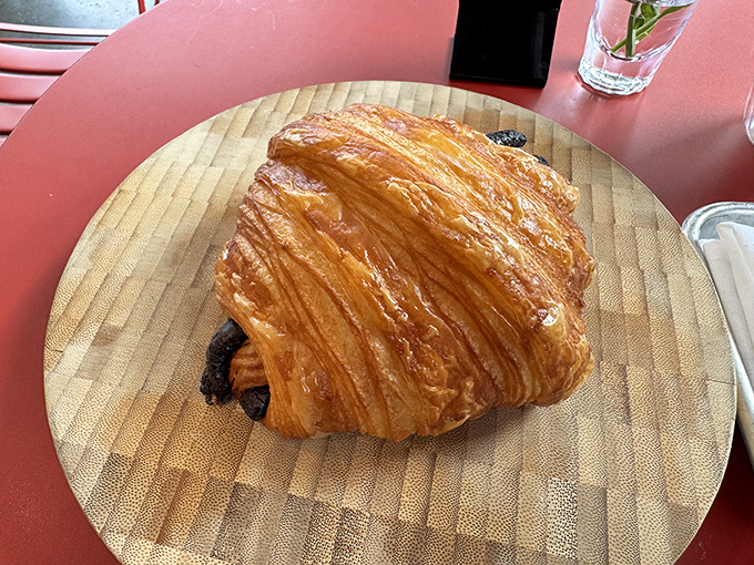 This chocolate croissant has more perfect layers than your favorite Netflix drama. The chocolate peeks out just enough to tease.