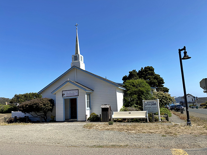 This charming white chapel stands as a serene reminder that even in paradise, locals occasionally need forgiveness for hoarding all this beauty from the rest of us.