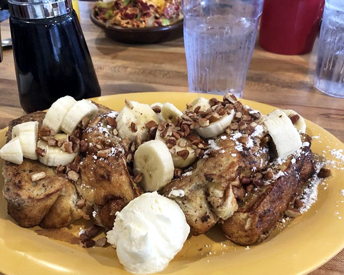 French toast that's had a spa treatment&mdash;pampered with cinnamon, crowned with bananas, and given a pecan confetti shower.